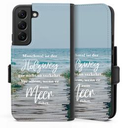 DeinDesign Galaxy S22 Handy Klapph&uuml;lle Handyh&uuml;lle aus Kunst Leder schwarz Flip Case Statement Beach Spruch Sideflip mit langer Lasche