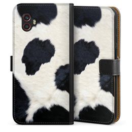 DeinDesign Galaxy XCover 6 Pro Handy Klapph&uuml;lle Handyh&uuml;lle aus Kunst Leder schwarz Flip Case Animal Print Cow Skin Animal Look Sideflip mit langer Lasche