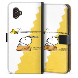 DeinDesign Galaxy XCover 6 Pro Handy Klapph&uuml;lle Handyh&uuml;lle aus Kunst Leder schwarz Flip Case Peanuts Snoopy Children Sideflip mit langer Lasche