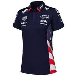 Castore Red Bull Racing Amerika Rennen Damen Polo-Shirt in Marineblau