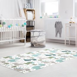 Vinylteppich - Freundliche Dinosaurier mit Palmen und Kakteen - Illustration blau Tiere Vinylmatte Dinosaurier Kinderzimmer