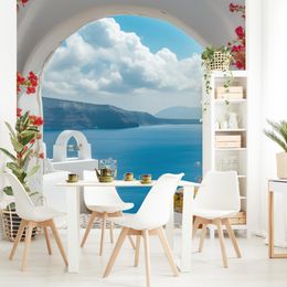 Bilderwelten Fototapete Strand Motiv Wandtapete bunt - Santorini Blick durch Steinbogen - Griechenland Wohnzimmer Schlafzimmer