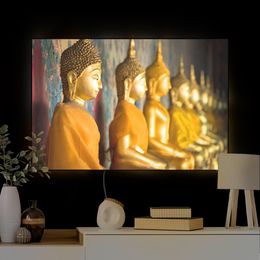 Bilderwelten LED-Wechselbild Goldene Buddha Statuen