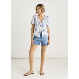 Blaues Oberteil mit strukturiertem Blumenmuster und Bindeband vorne