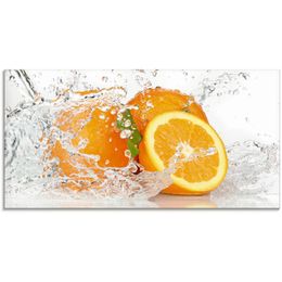 Artland Glasbild &raquo;Orange mit Spritzwasser&laquo; S&uuml;&szlig;speisen 1 Stk. tlg. in verschiedenen Gr&ouml;&szlig;en orange B/H/T: 60cm x 30cm, Glasbild S&uuml;&szlig;speisen, 1 Stk.