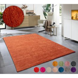 Theko Wollteppich &raquo;Holi&laquo; rechteckig 13 mm H&ouml;he Uni-Farben, leicht meliert, reine Wolle, handgewebt mit Kn&uuml;pfoptik orange Schurwolle B : 90cm 1 Stk., 