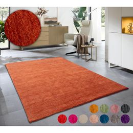 OTTO home Wollteppich &raquo;Karchau, Handwebteppich&laquo; rechteckig 13 mm H&ouml;he reine Wolle, meliert, handgewebt, brilliante Farben orange Schurwolle B : 140cm 