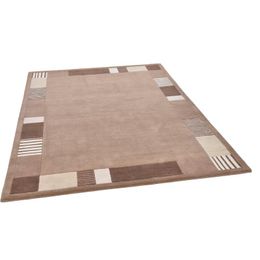 Theko Wollteppich &raquo;Royal Nepali 3085&laquo; rechteckig 15 mm H&ouml;he reine Wolle, handgetuftet, Uni-Farben, mit Bord&uuml;re, modernes Design braun Schurwolle B : 