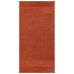Lacoste Handtuch &raquo;LLECROCO&laquo; mit Label-Applikationen orange Frottier, Obermaterial: 100% Baumwolle B/L: 50cmx100cm, 1 Stk., Frottier