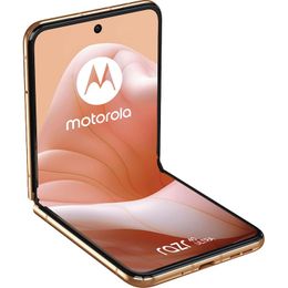 Motorola Smartphone &raquo; razr40 ultra&laquo; Peach Fuzz orange STATIV-FUNKTION. Stelle das Smartphone auf eine flache Oberfl&auml;che und starte ein Zeitraffer-Video oder 