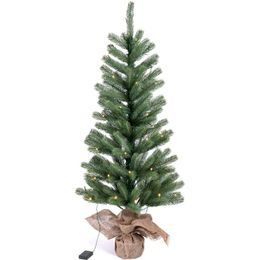 IC Winterworld K&uuml;nstlicher Weihnachtsbaum &raquo;LED-Tannenbaum, k&uuml;nstlicher Christbaum&laquo; Nordmanntanne Weihnachtsdeko mit Jutebeutel um den Betonfu&szlig;, 