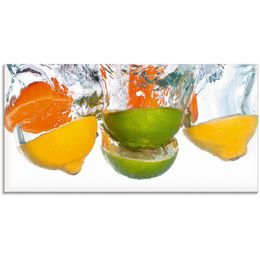 Artland Glasbild &raquo;Zitrusfr&uuml;chte fallen in klares Wasser&laquo; Lebensmittel 1 Stk. tlg. in verschiedenen Gr&ouml;&szlig;en bunt B/H/T: 60cm x 30cm, Glasbild Lebensmittel, 1 