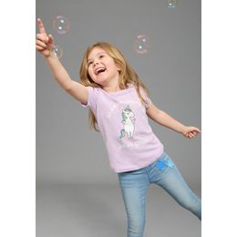 Kidsworld M&auml;dchen Kidsworld T-Shirt &raquo;Mit Einhorn-Druck und Glitzereffekten&laquo; mit stylischem Einhorn-Print lila 128/134