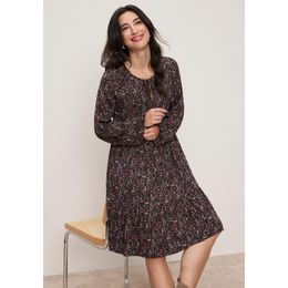 Tamaris Damen Jerseykleid &raquo;mit figurbetonter Passform, Mini-L&auml;nge, gebl&uuml;mte Optik&laquo; mit modernen Schleifen-Details bunt 32/34, N-Gr