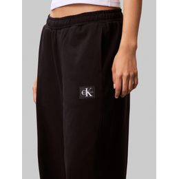 Damen Sweathose "A- FRENCH TERRY BADGE LOGO PANT", schwarz, Gr. M, Calvin Klein Jeans, unifarben, Sweatware, Obermaterial: 100% Baumwolle, Hosen, mit