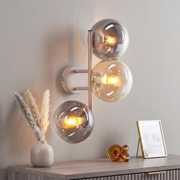 hofstein Wandleuchte Gastor mit Glasschirmen in Rauch, Bernstein und Klar, vertikale Cluster-Anordnung Metallgestell in Sandfarben, E14, 25 Watt, mit 3 Flammen