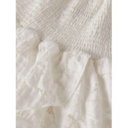 name it Rock in White Alyssum | Gr.: 164