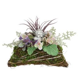 OTTO home Kunstblume &raquo;Kunstblumen-Gesteck aus Hortensie mit Engel auf Pflanzkissen&laquo; Florales Dekogesteck mit Engelfigur und Kunstpflanzen gr&uuml;n B/H/L: 