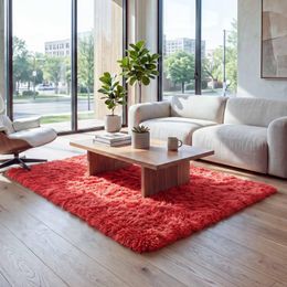 Teppich MCW-F69, Shaggy L&auml;ufer Hochflor Langflor, Stoff/Textil flauschig weich 200x140cm ~ rot