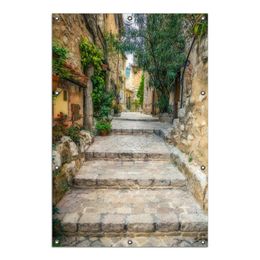 Wallario Gartenposter ca. 100 x 150 cm Alte steinerne Gasse in S&uuml;dfrankreich