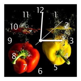 Wallario Uhr 30 x 30 cm, wei&szlig;e Zeiger Bunte K&uuml;che Paprika in rot gelb orange und gr&uuml;n im Wasser