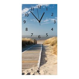 Wallario Uhr 30 x 30 cm, wei&szlig;e Zeiger Auf dem Holzweg zum Strand