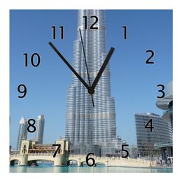 Wallario Uhr 30 x 60 cm, wei&szlig;e Zeiger Wolkenkratzer in Dubai