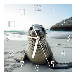 Wallario Uhr 20 x 20 cm, wei&szlig;e Zeiger Robbe am Strand