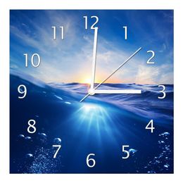 Wallario Uhr 30 x 30 cm, wei&szlig;e Zeiger Wellen im Meer bei Sonnenuntergang