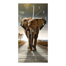 Wallario Uhr 30 x 60 cm, wei&szlig;e Zeiger Elefant bei Sonnenaufgang in Afrika