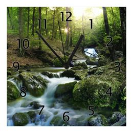 Wallario Uhr 30 x 60 cm, wei&szlig;e Zeiger Flie&szlig;ender Bach im Wald bei Sonnenuntergang