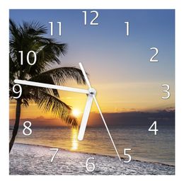 Wallario Uhr 30 x 30 cm, wei&szlig;e Zeiger Palme am Strand - Sonnenuntergang &uuml;ber dem Meer