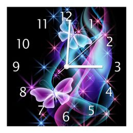 Wallario Uhr 30 x 30 cm, wei&szlig;e Zeiger Schmetterlinge in bunten, strahlenden Farben