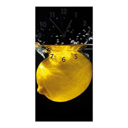 Wallario Uhr 20 x 20 cm, wei&szlig;e Zeiger Zitrone im Wasser - Frisches Obst f&uuml;r die K&uuml;che