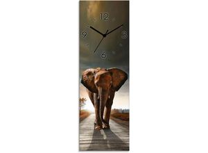 4062144286524 - Wanduhr ARTLAND Ein Elefant läuft auf der Straße Wanduhren Gr B H T 20 cm x 60 cm x 18 cm Funkuhr braun Wanduhren wahlweise mit Quarz- oder Funhuhrwerk lautlos ohne Tickgeräusche